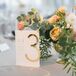 Elegant Table Numbers and Flower Centerpieces