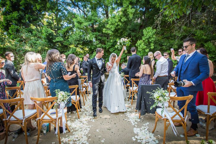 Classic Recessional with Rose Petals and Cross-Back Chairs