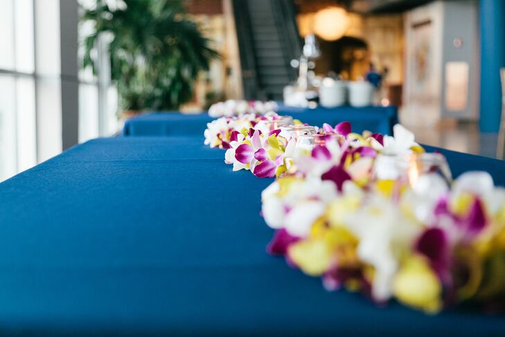 Purple, Yellow and White Lei Centerpiece
