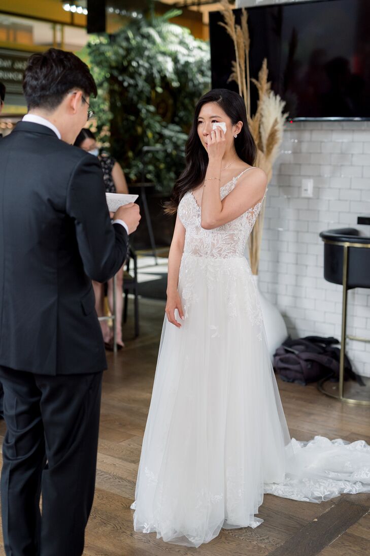 Bride Crying During Vow Exchange at Wedding Ceremony