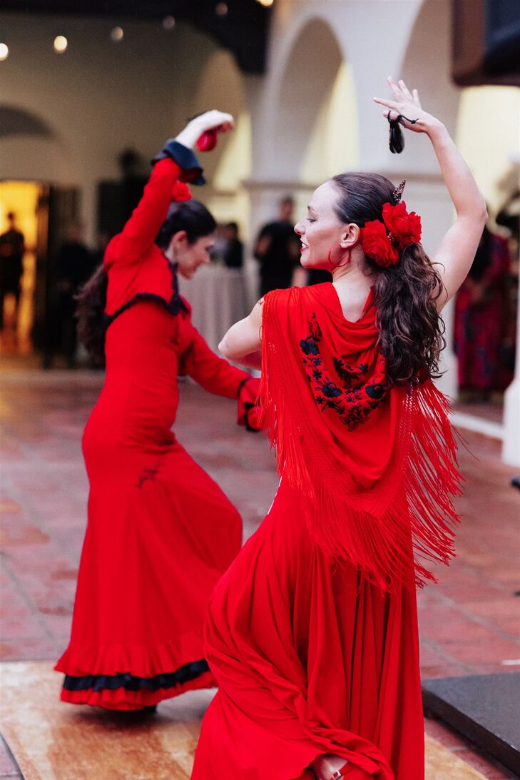 Flamenco Dancers in All Red Performing at a Historic San Diego Museum