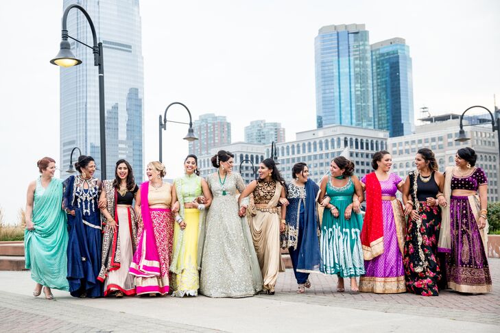 Glamorous Indian Wedding Party in Colorful Dresses and Saris