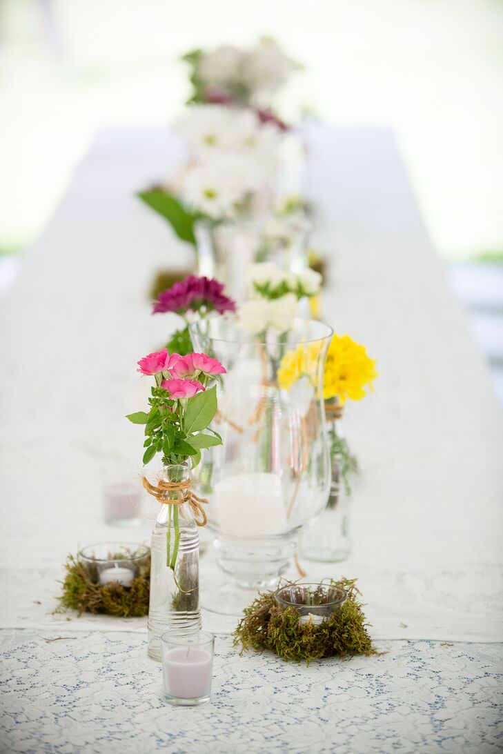 White Lace Table Linens with Wildflower Centerpieces on Farmhouse Tables