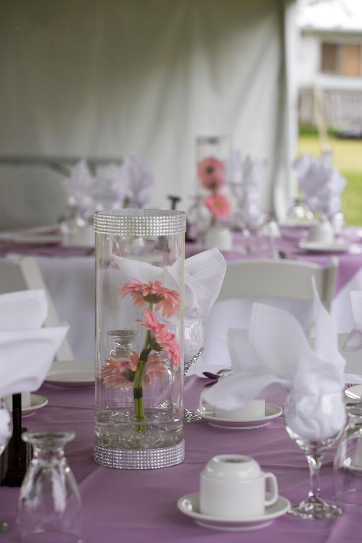 Purple Table Linens and Pink Gerbera Daisy Centerpieces