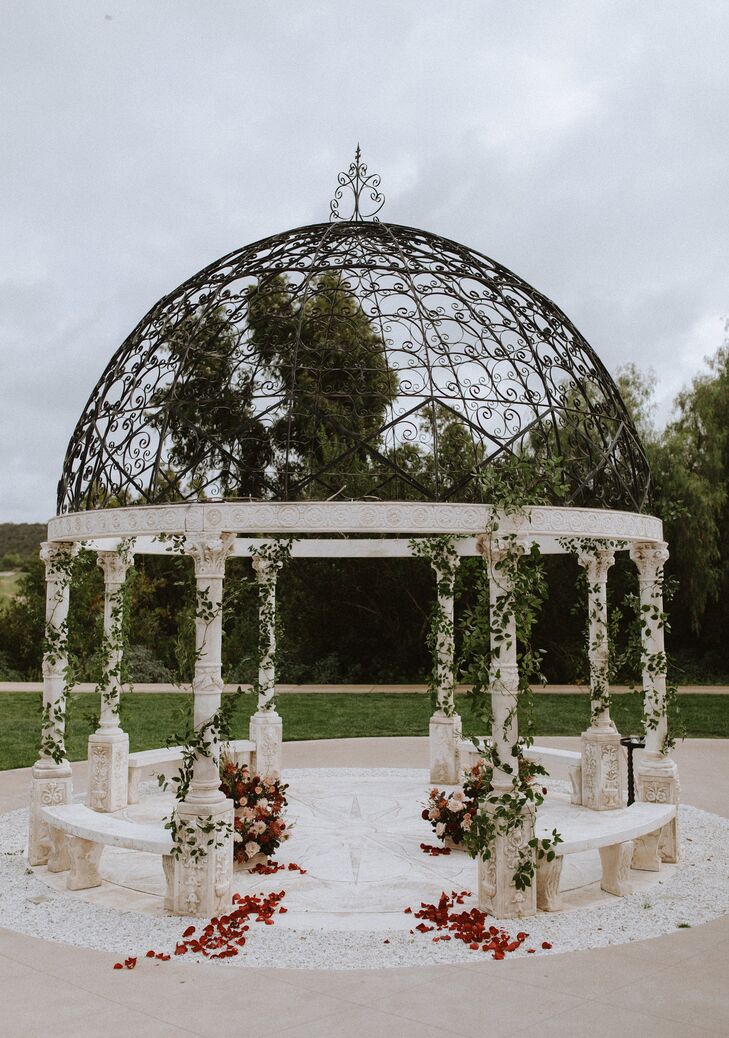 Iron Wedding Arch with Greenery and Flowers