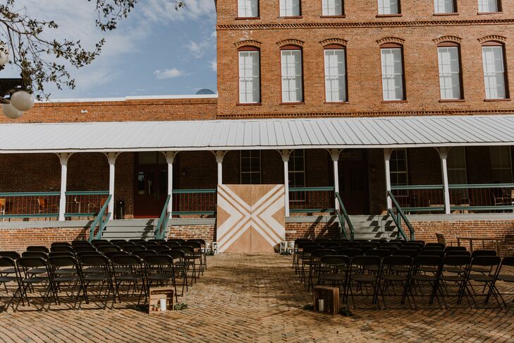 Simple Ceremony Setup with Geometric Backdrop