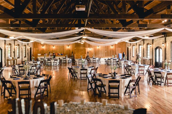 Rustic Wood Beam and Stone Wall Reception Barn