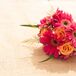 Bouquets of Fuschia Gerbera Daisies, Orange Roses and Baby's Breath