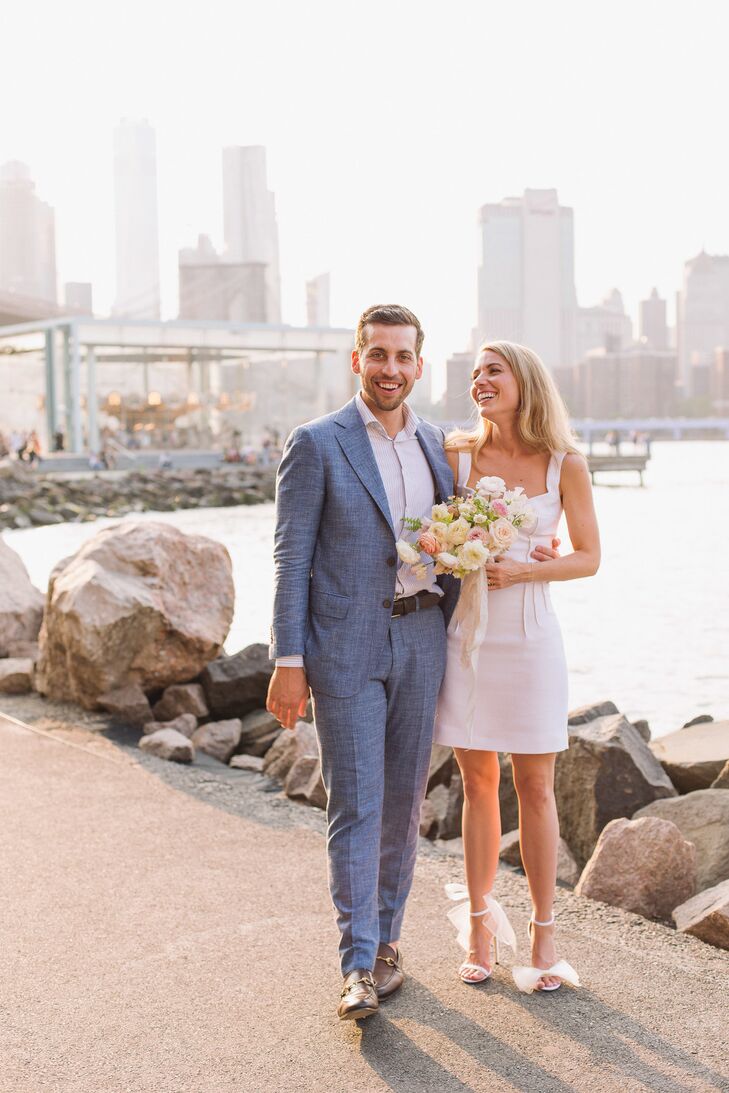 Modern Couple Wearing Gray Suit and Short Dress in New York City