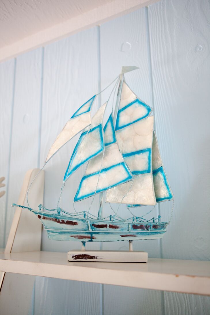 White and Blue Ship Model Decor